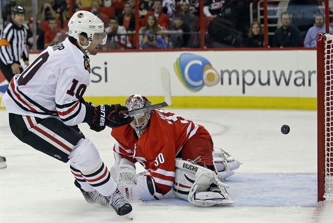 Patrick Sharp's shootout goal lifts Blackhawks past Hurricanes 3-2 for ...
