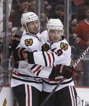 Toews, Hossa and Sharp give Blackhawks 4-3 shootout win over Red Wings