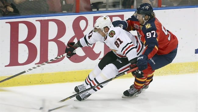 Toews, Sharp score in shootout to send Blackhawks to 3-2 victory over ...