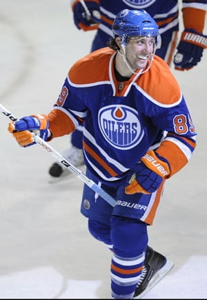 Three third-period goals lead Canucks to 5-3 victory over Oilers