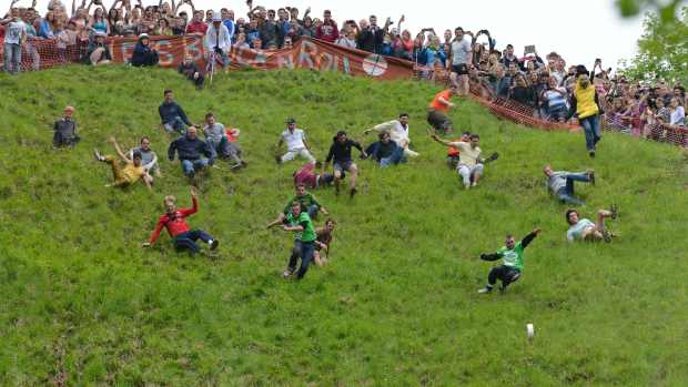 Woman Wins Famous English ‘Cheese Rolling Race’ Even After Being ...