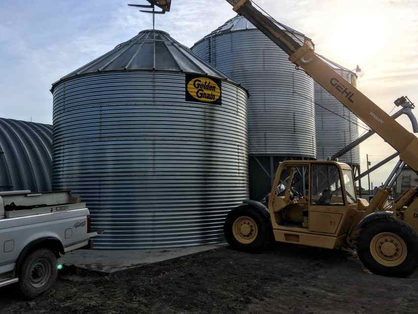 How to Build a Grain Bin with a Hopper--Lifting and Securing Bin to ...