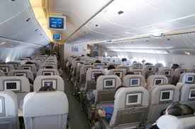 How to Fly Comfortably in Economy Class on Long-Distance International ...