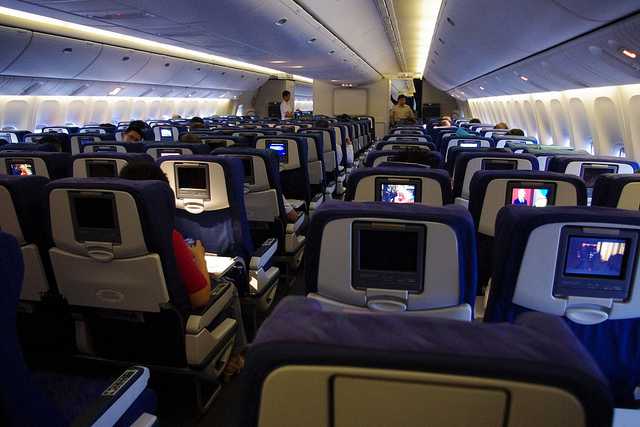 How to Fly Comfortably in Economy on Long-Distance International ...