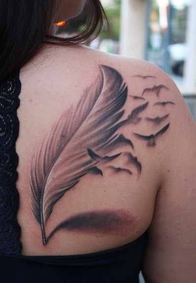 Compelling and Unusual Feather Tattoos - HubPages