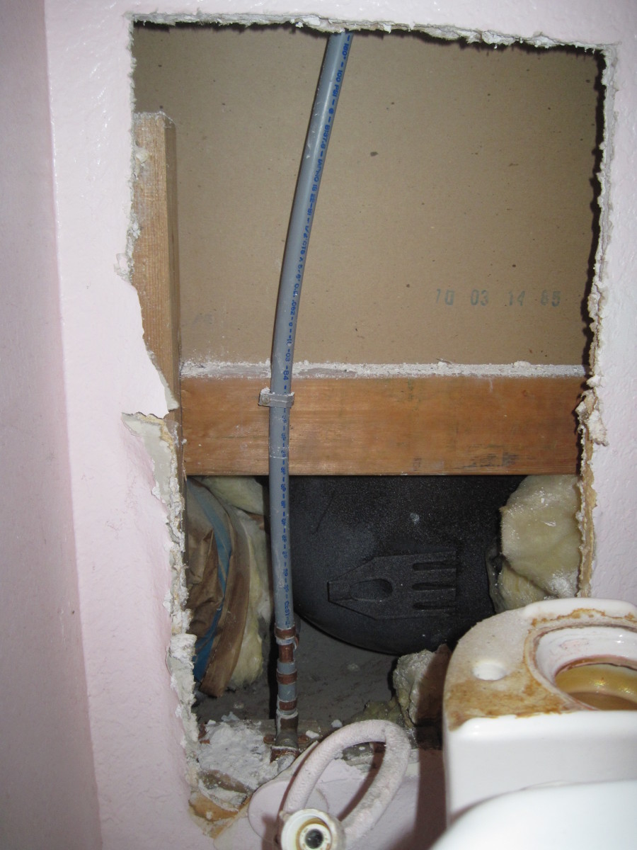Calling a Plumber to Fix a Broken Pipe in the Bathroom - HubPages