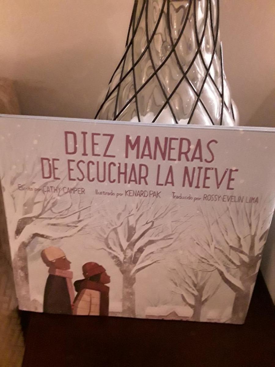 Snowfall and Family Celebration With Text in Spanish in Beautiful ...