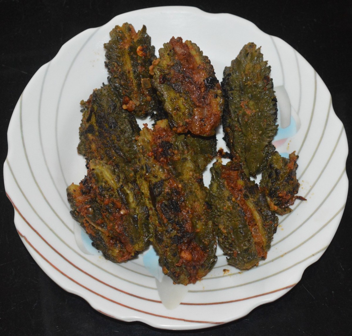 Stuffed Karela (Bitter Gourd): Traditional Indian Curry - Delishably