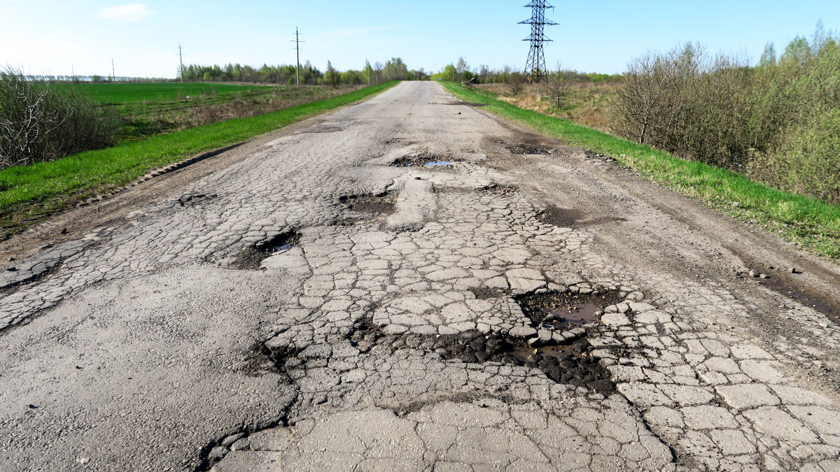 Save Money on Car Repairs: What To Do When a Pothole Damages Your ...
