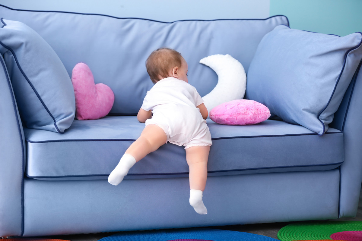 Baby Makes It to Top of the Couch and It's a Big Deal - WeHaveKids News