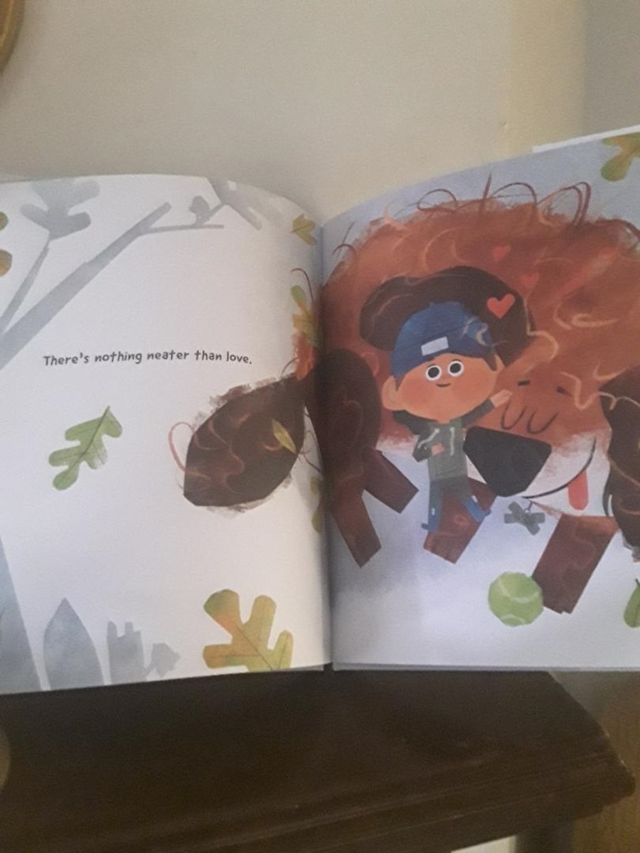 Messy in the Form of a Dog Challenges a Young Boy in Humorous Picture ...